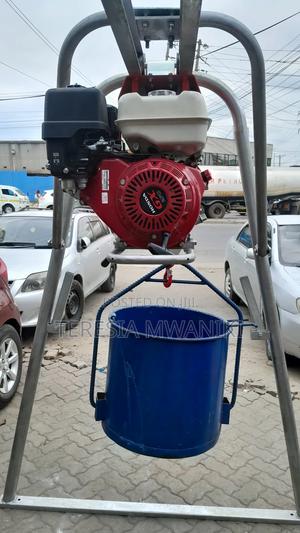 Portable Building Lifting Hoist With Gasoline Engine in Industrial Area ...